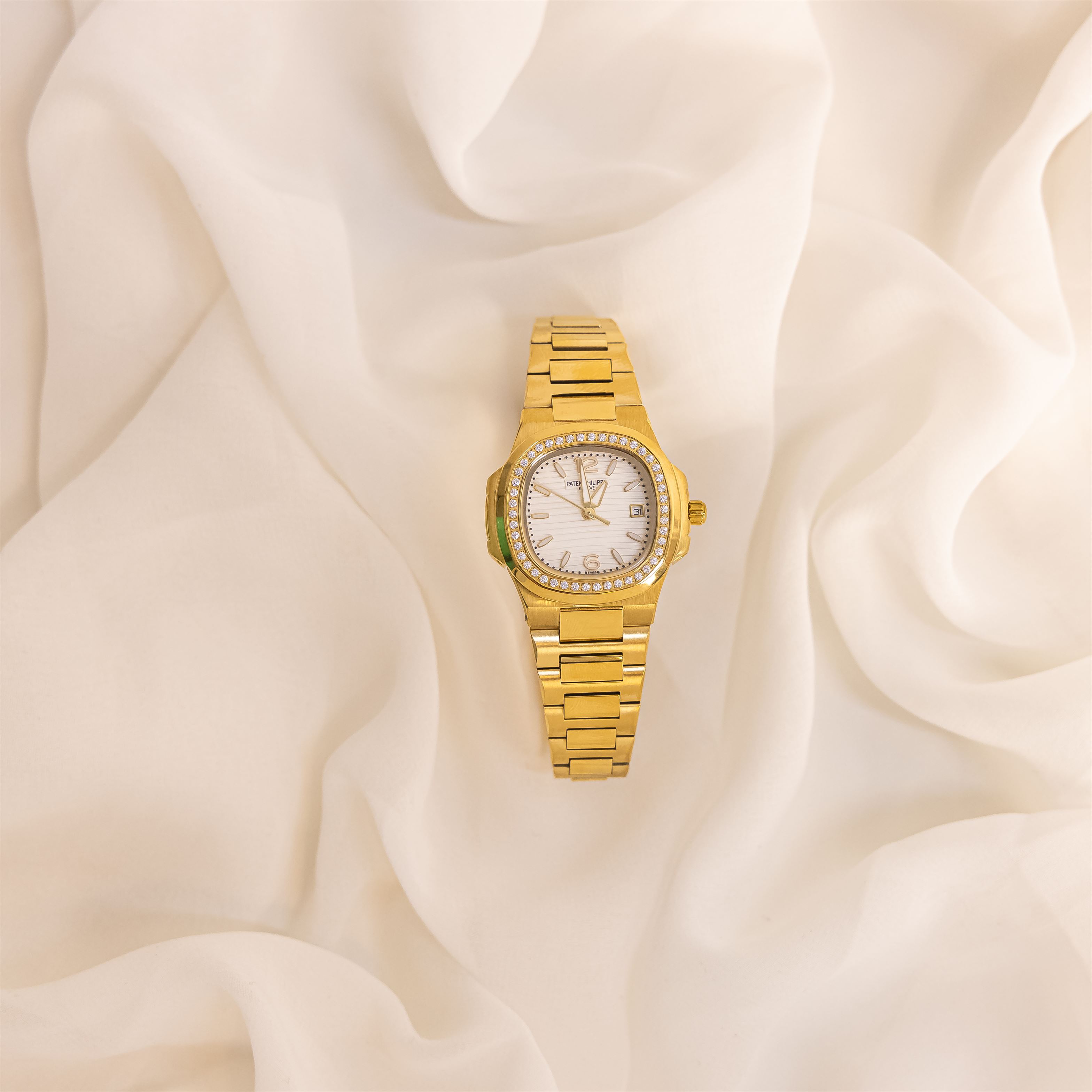 Pat Nautilus Gold with Diamond Bezel